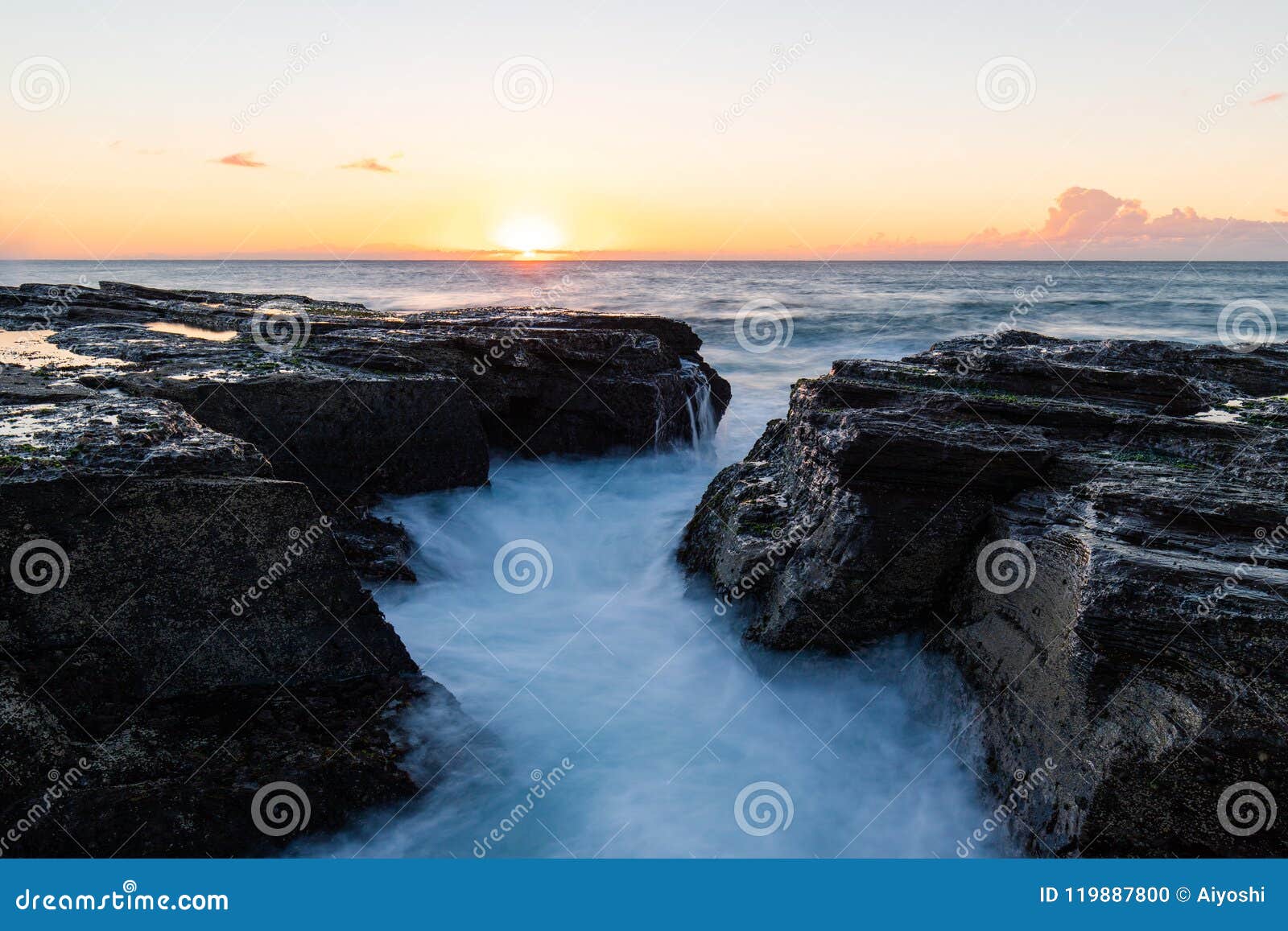 Water flow between rocks stock photo. Image of water - 119887800