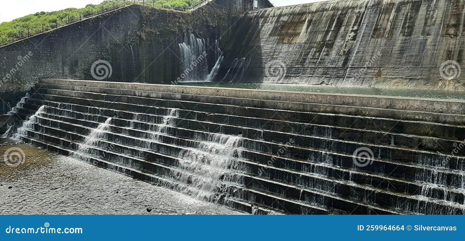 Water flowing on Dam steps stock photo. Image of water - 259964664