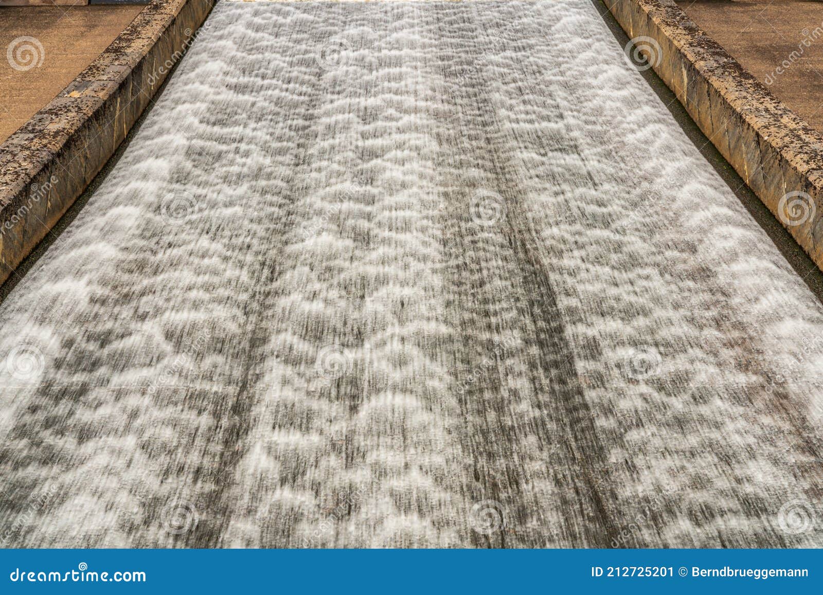 Water flowing down a dam stock image. Image of structure - 212725201