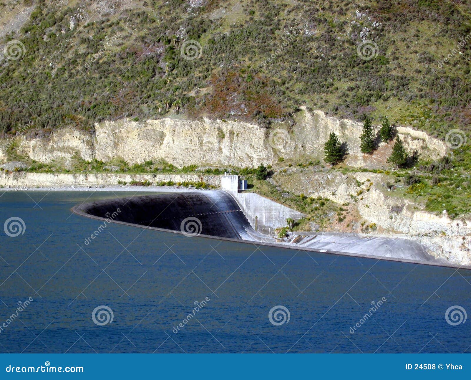 Water flowing over dam stock photo. Image of mountainside - 24508