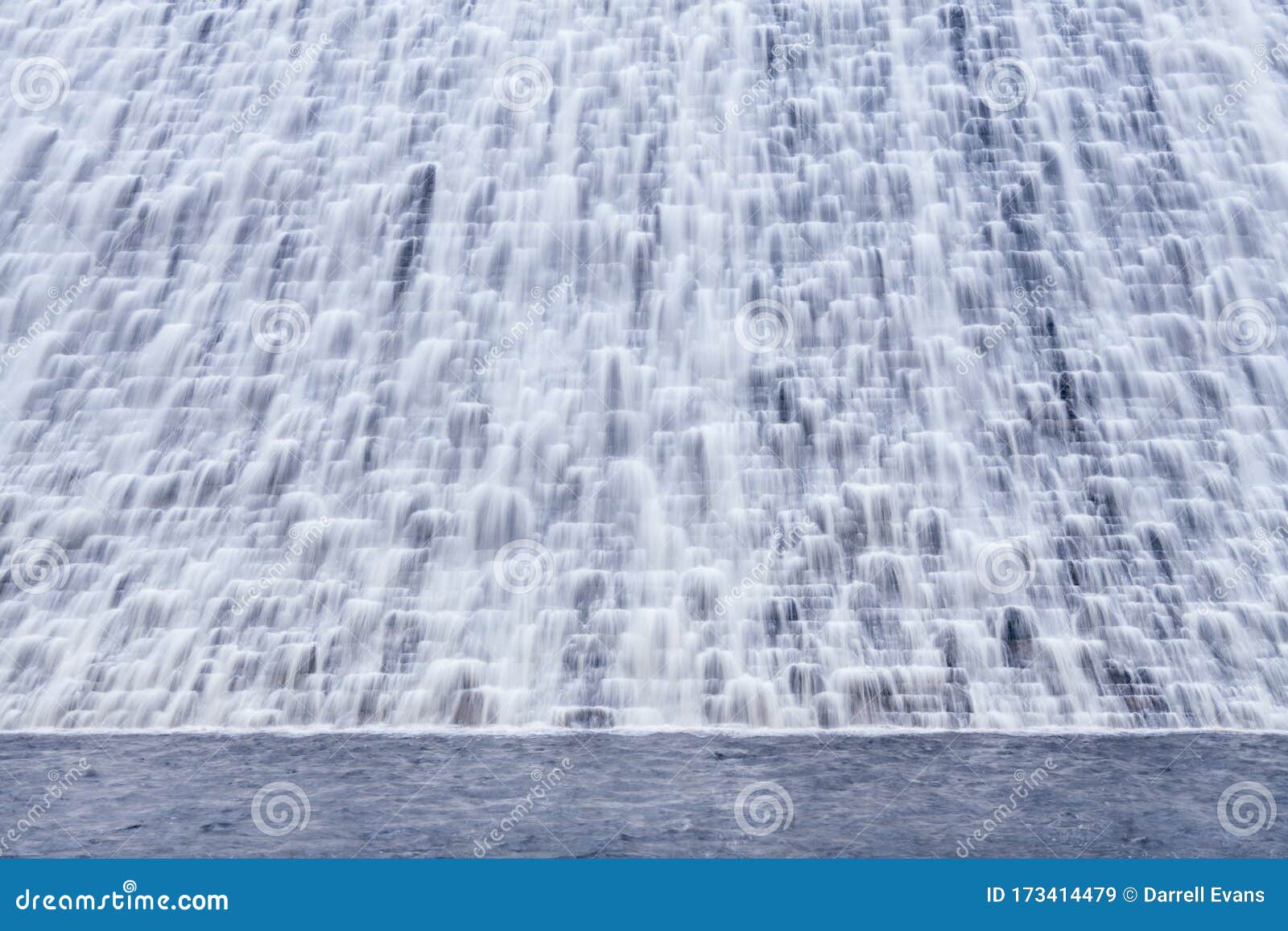 Water flowing over a dam stock image. Image of cascade - 173414479