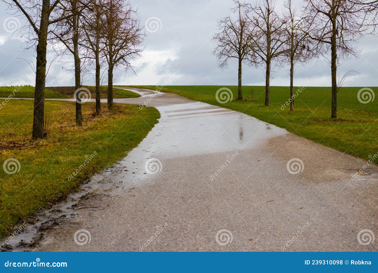 Water Flowing Over a Road from the Fields after Heavy Rainfall Stock ...