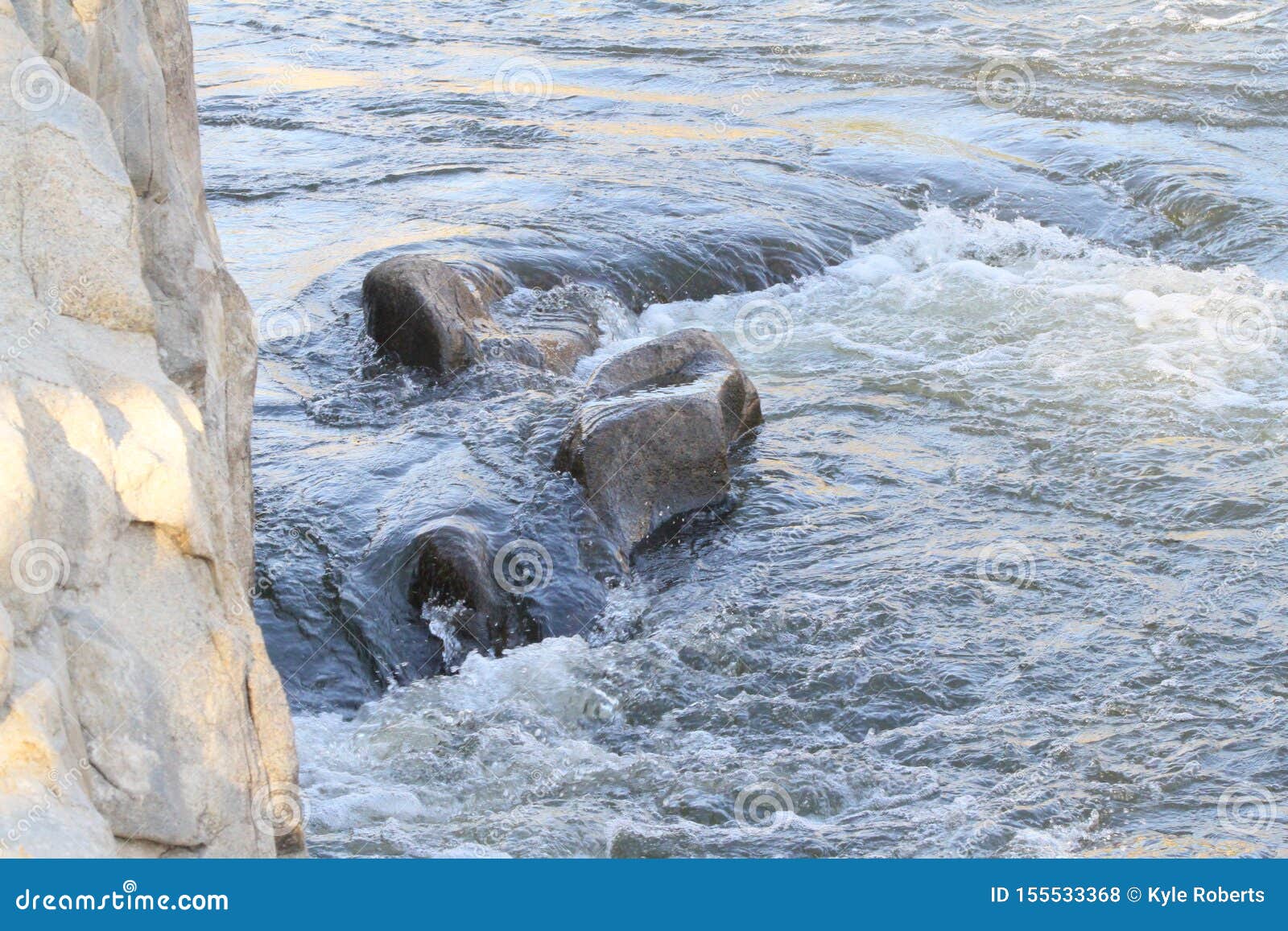 Water Flowing Over Rocks in Sea Stock Photo - Image of seaside ...