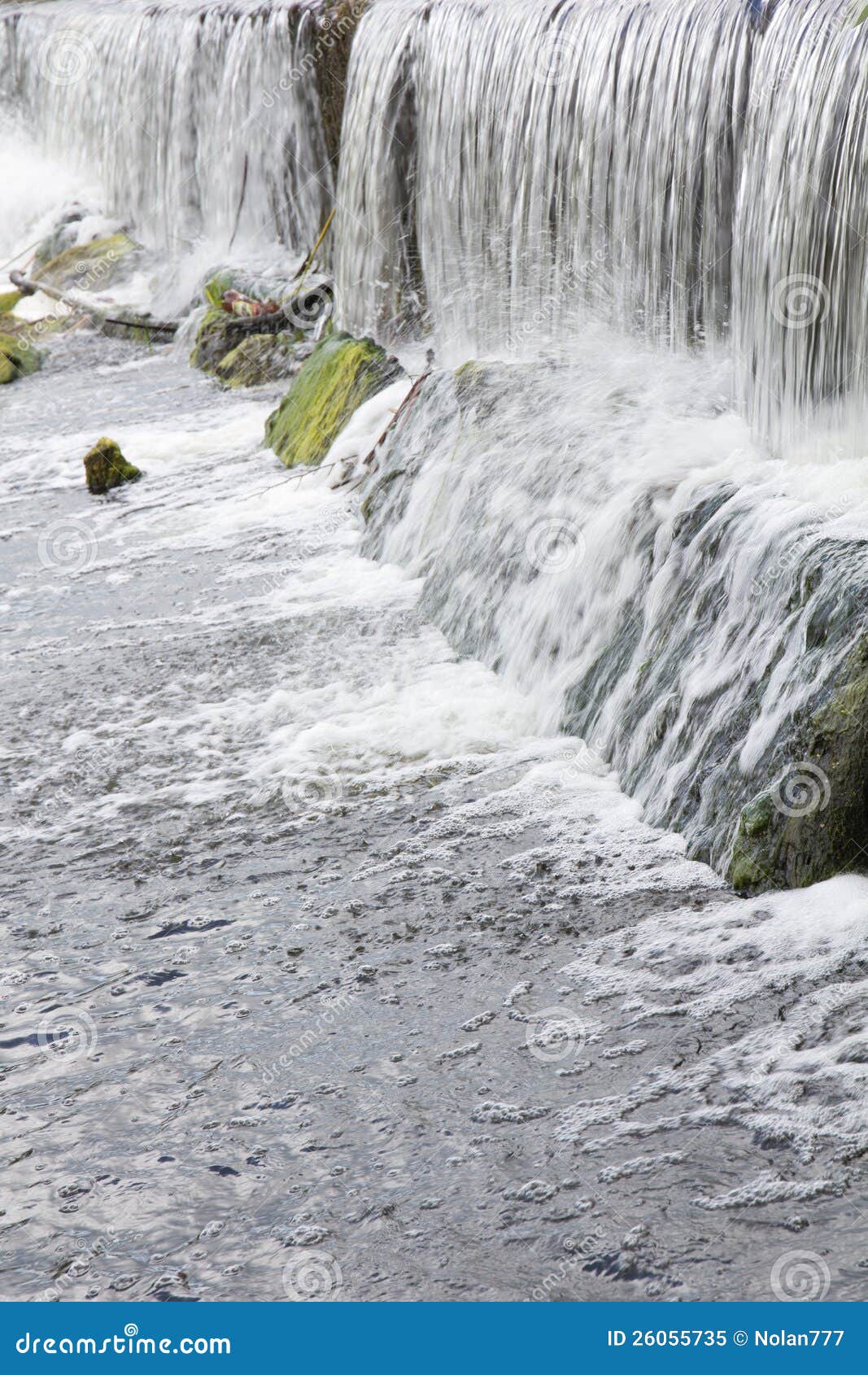 Water flowing over rocks. stock image. Image of stream - 26055735
