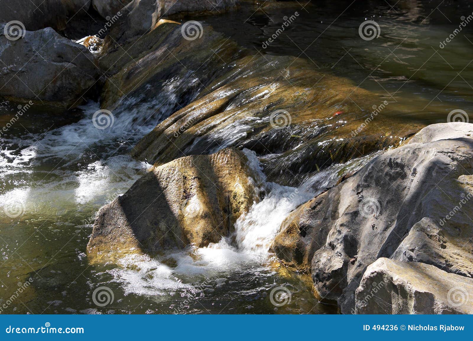 Water Flowing Over Rocks stock photo. Image of cascade - 494236