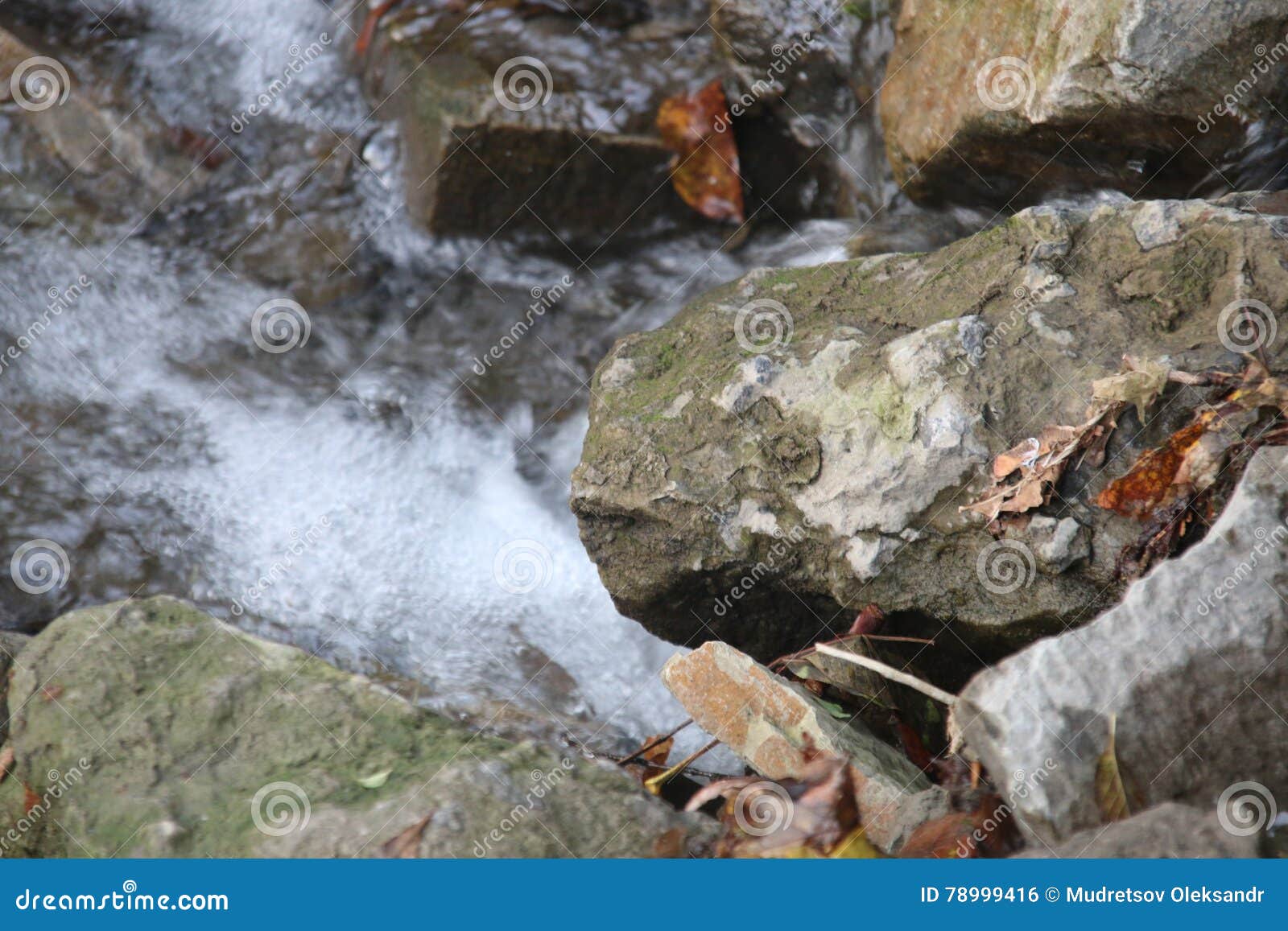 Water flowing over rocks stock photo. Image of stream - 78999416