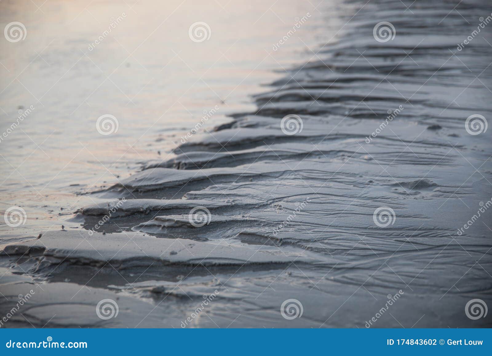 Water Flowing Patterns in Sea Sand Stock Photo - Image of rocks, serene ...