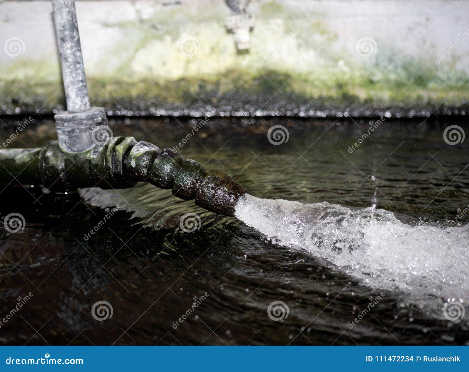 Water flowing from pipe stock photo. Image of closeup - 111472234