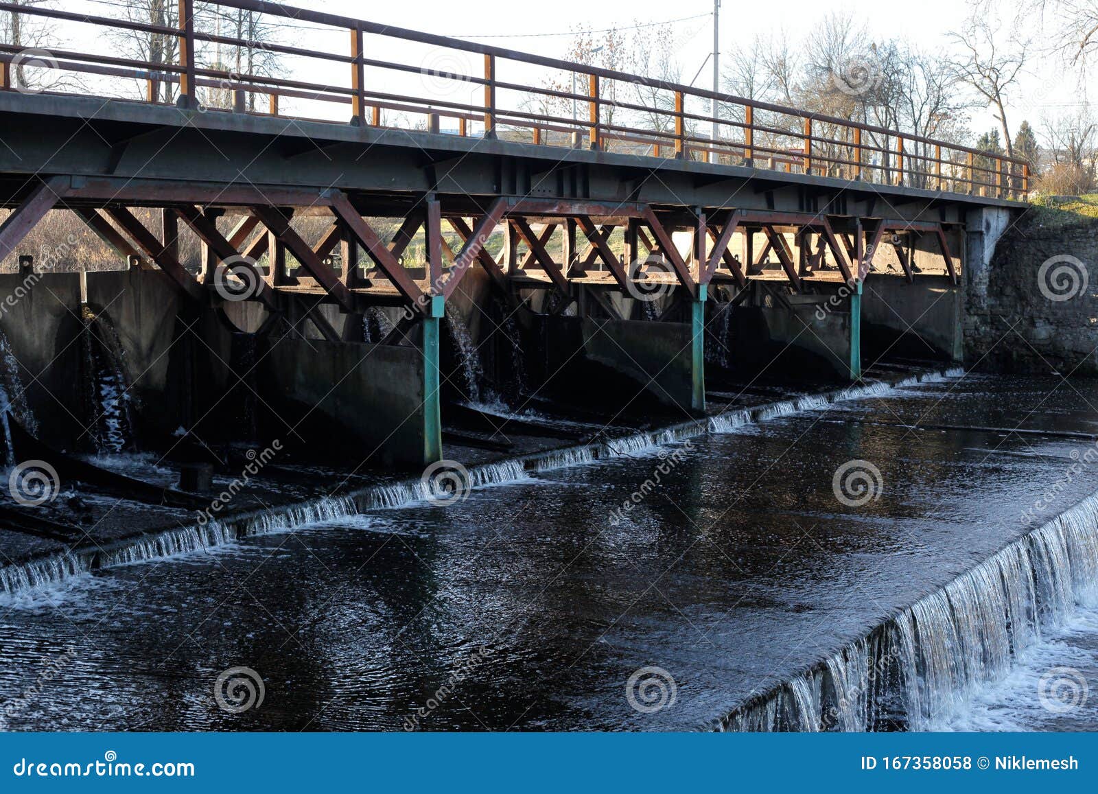 Water that Flows Silently through the Flat Steps of the Dam Under the ...