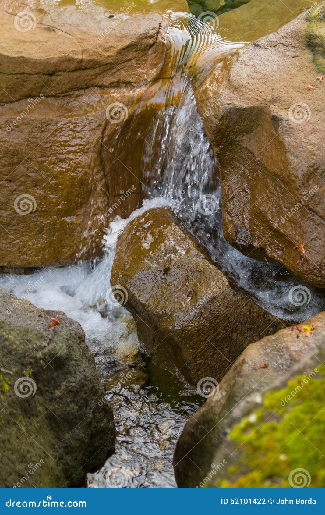 Water Flowing between Rocks Stock Photo - Image of outdoors, tranquil ...