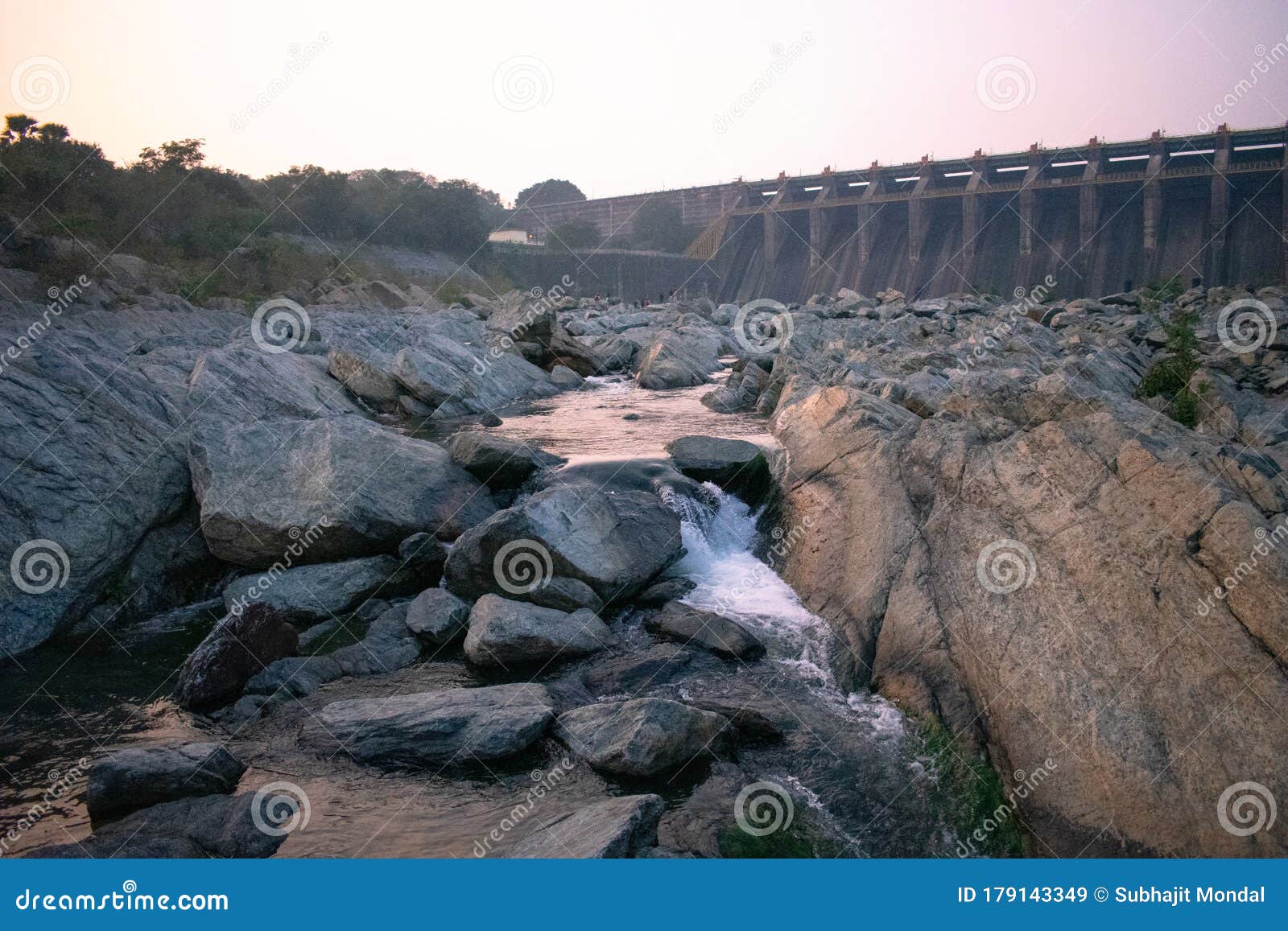 Water Flowing between the Rocks after Using it in a Dam Stock Image ...