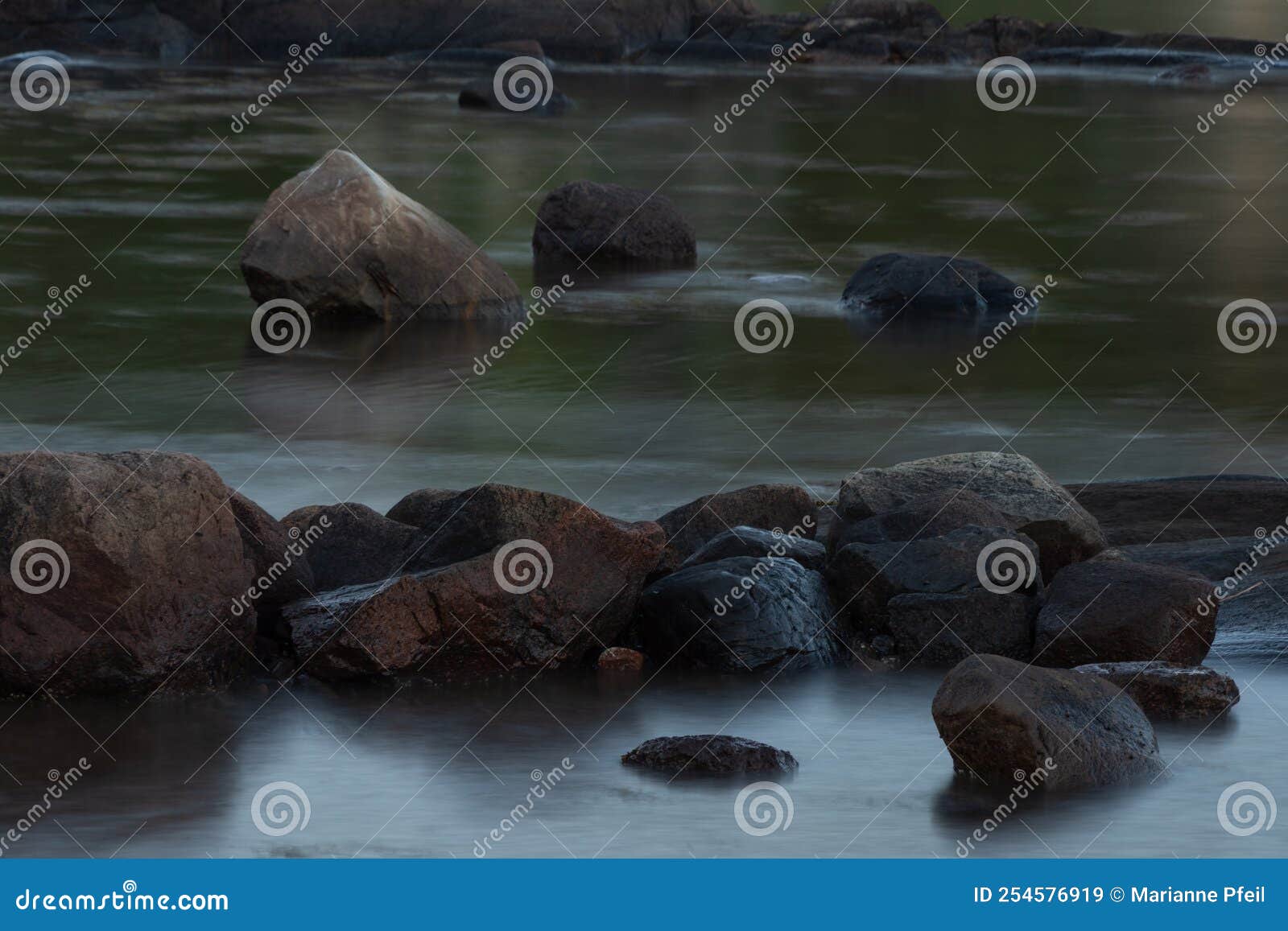 Water Flows Around Rock on a Summer Evening. Stock Image - Image of ...