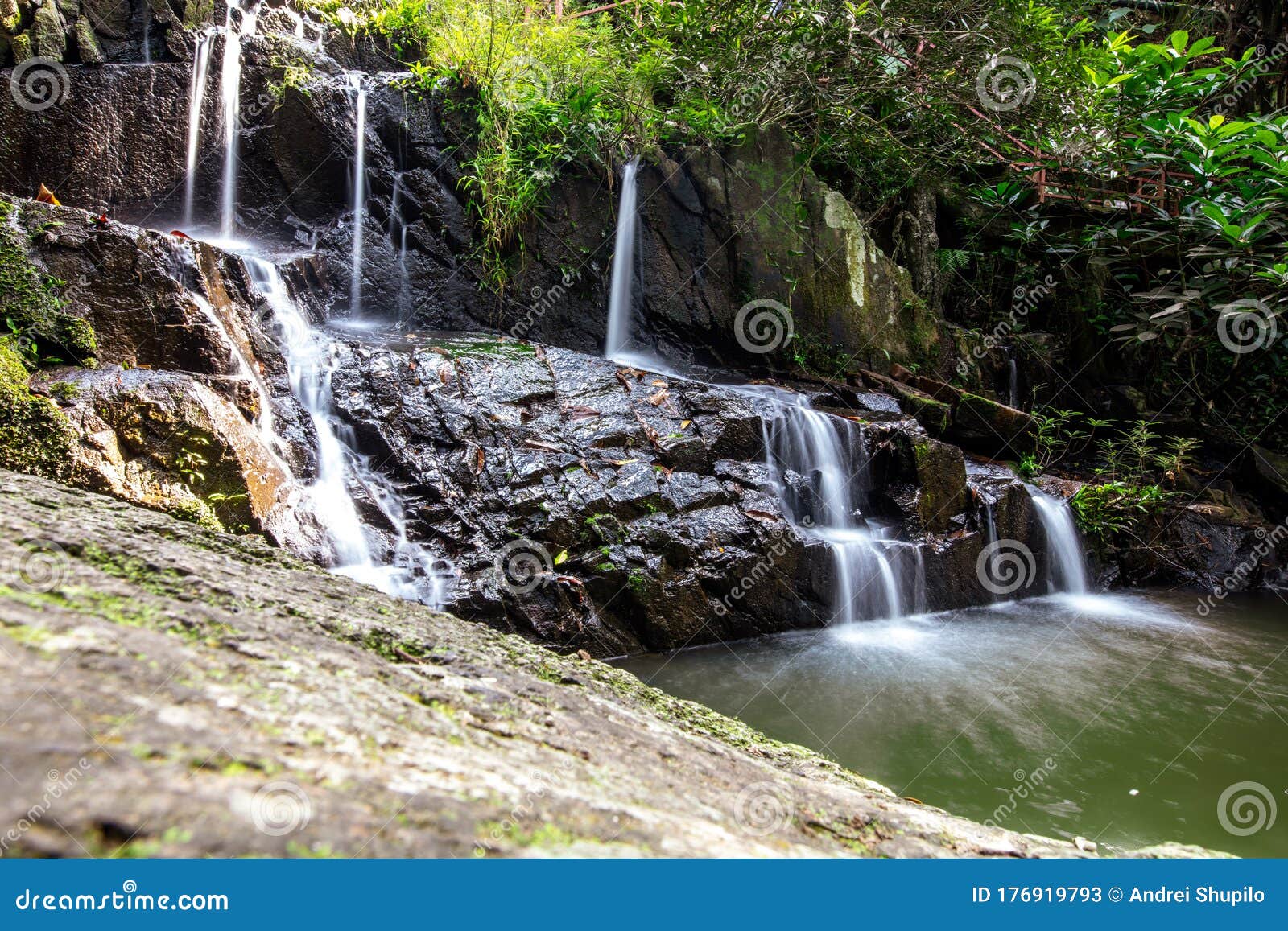Water Flows Down the Rocks. Waterfall in a Park Stock Image - Image of ...