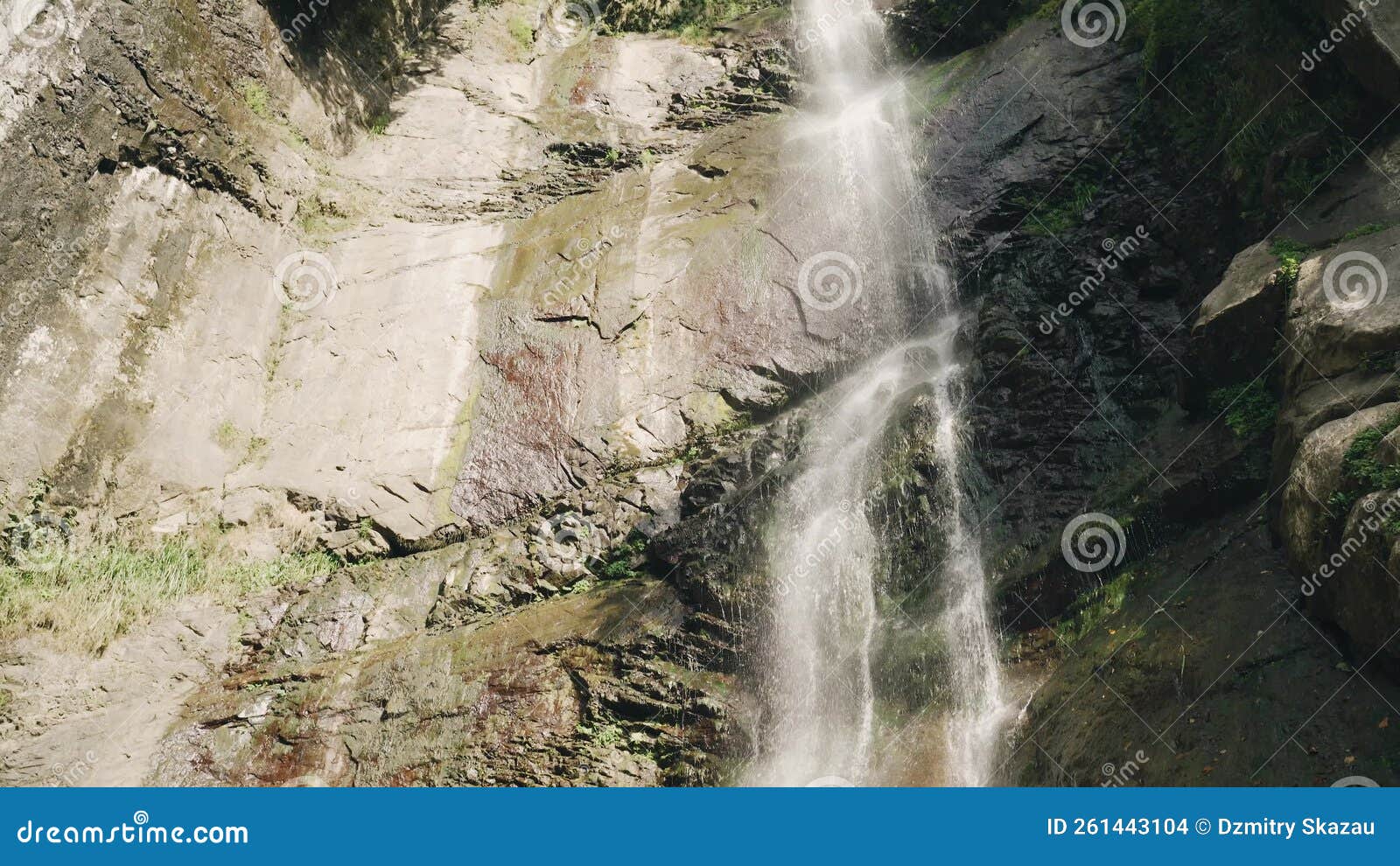 Water Flows Down the Steep Slope of the Mountain. Bottom View Stock ...