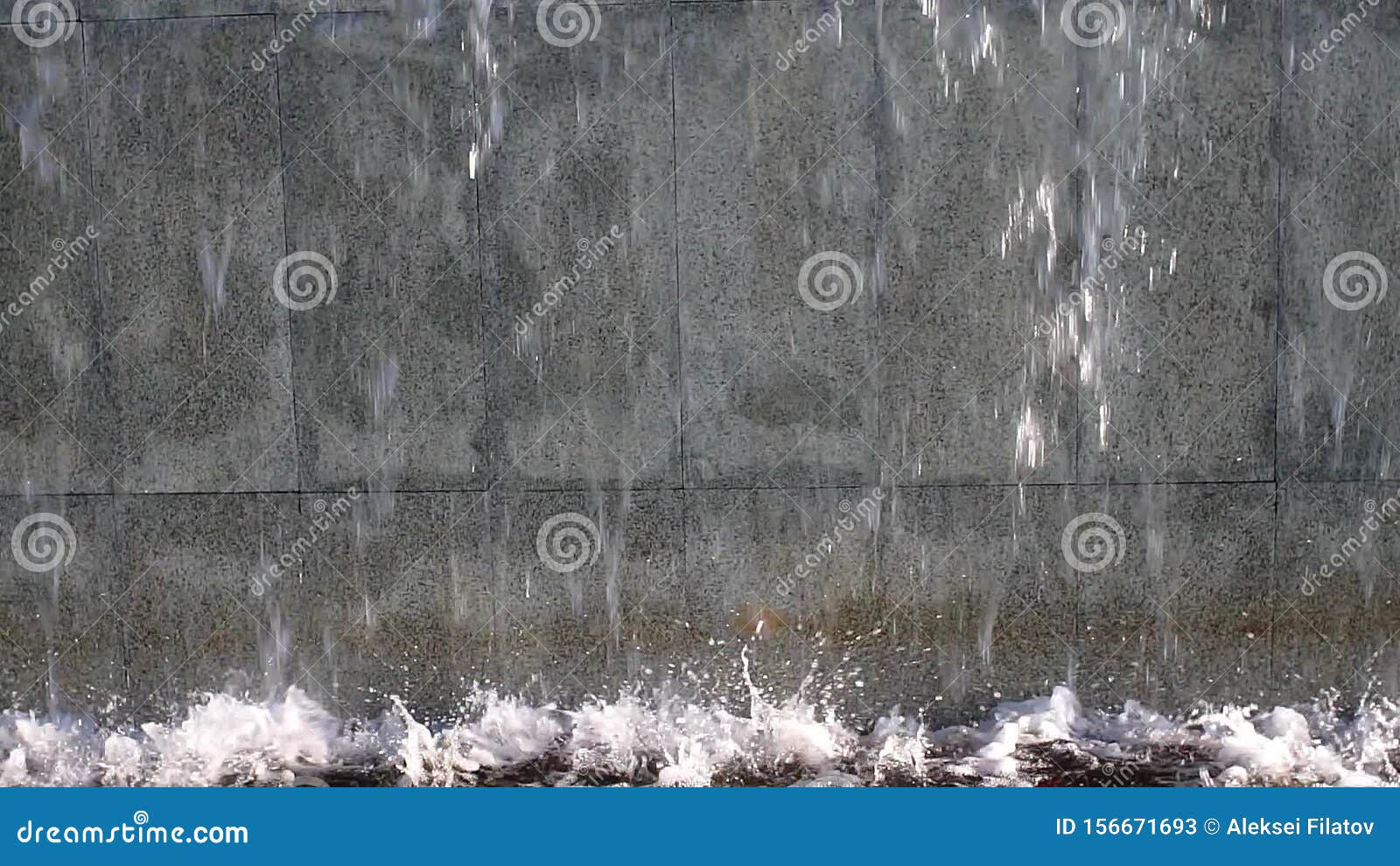 Water Flows Down the Waterfall on the Background Wall Stock Video ...