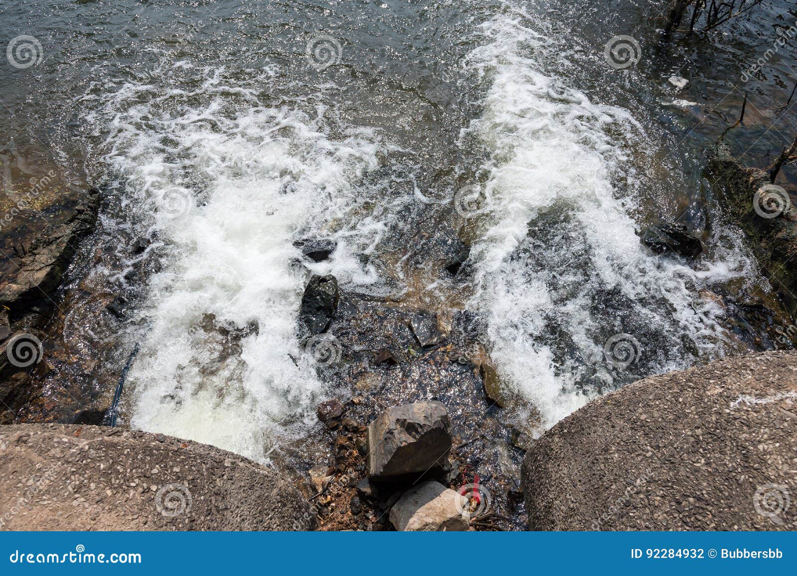 Water Flows from the Drain Pipe into the River Stock Photo - Image of ...