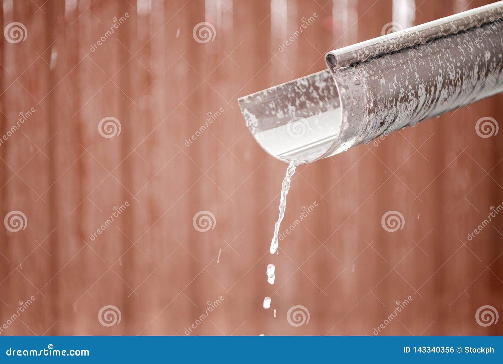 Water Flows through the Drain Pipe. Snow is Melting Stock Photo - Image ...