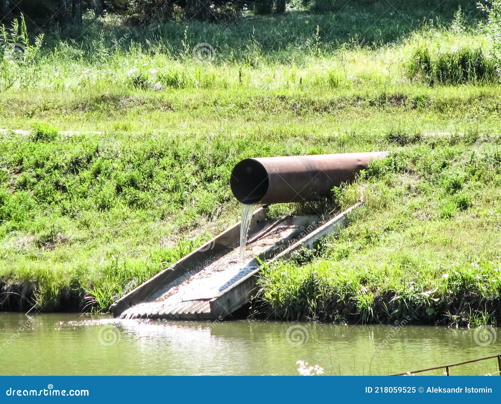 Water Flows from a Large Pipe into the Pond. Stock Image - Image of ...