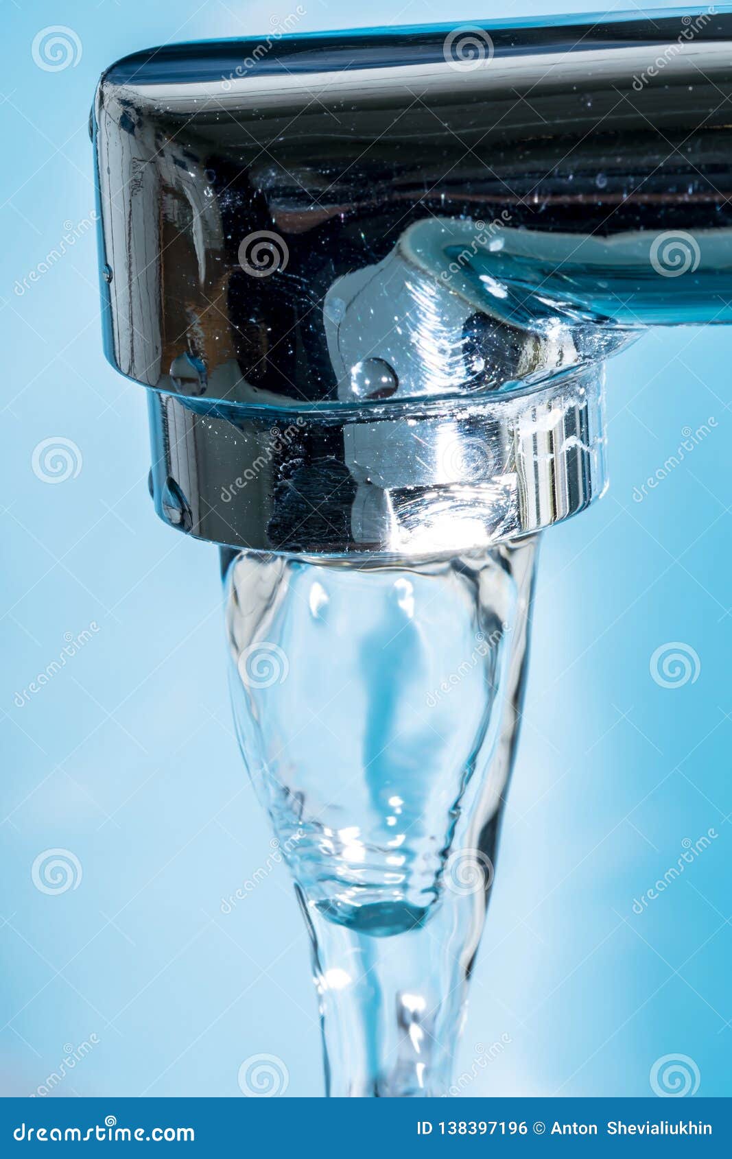 Water Flows from a Modern Chromed Water Tap Faucet Macro Close-up Stock ...