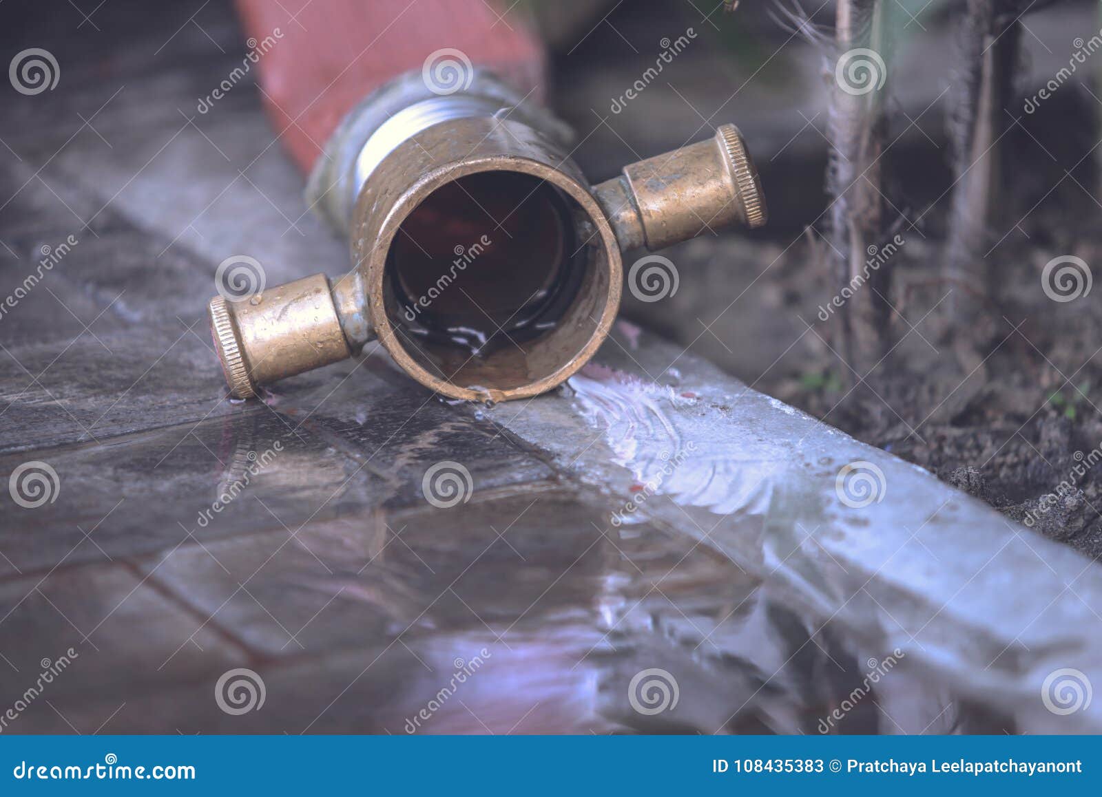 Water Flows Out of Fire Hose on the Rough Ground after Use Stock Image ...