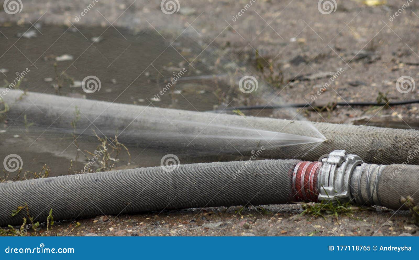 Water Flows Out of the Hole in the Fire Hose. Stock Image - Image of ...