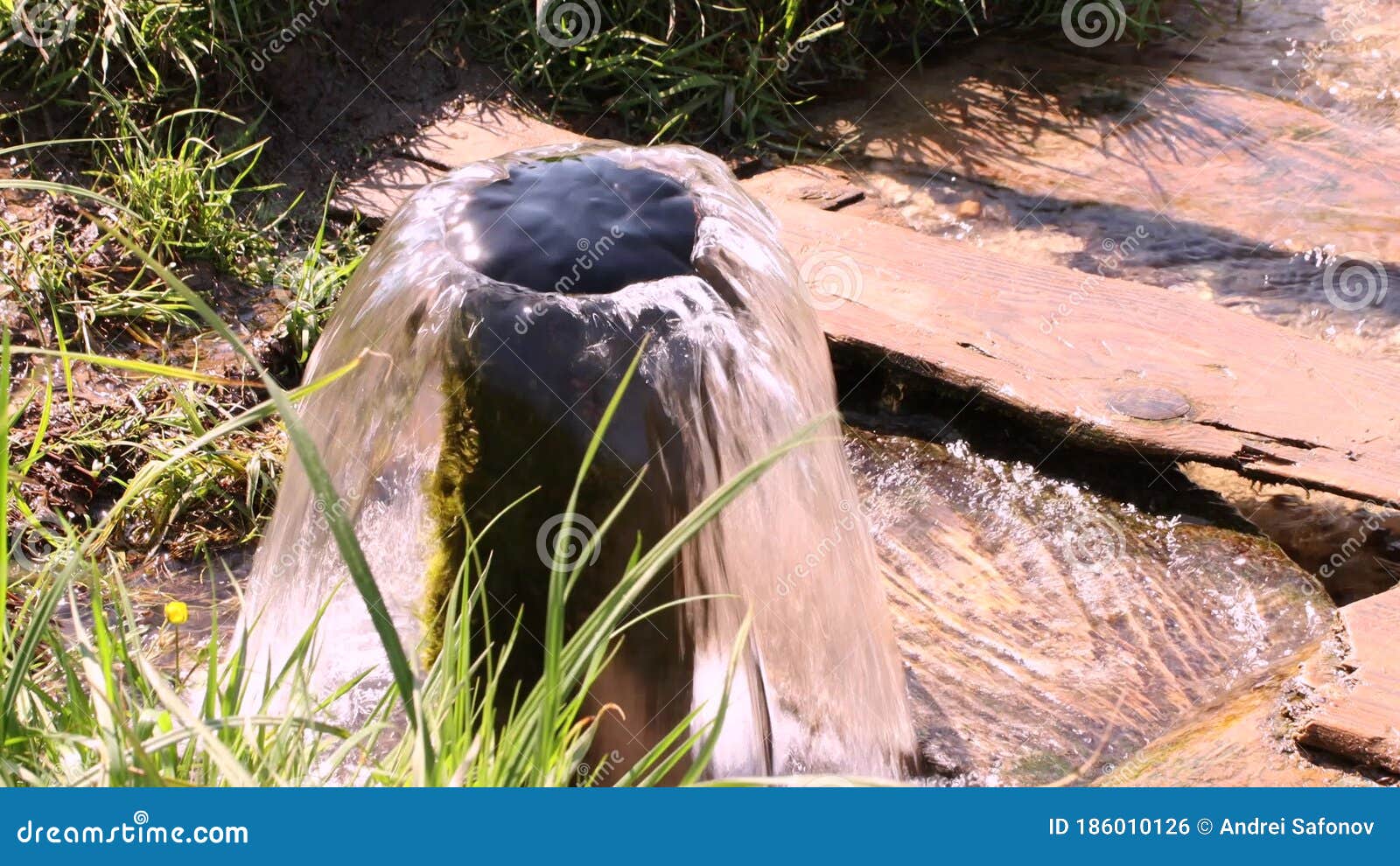 Water Flows Out of a Vertical Pipe. Stock Footage - Video of light ...
