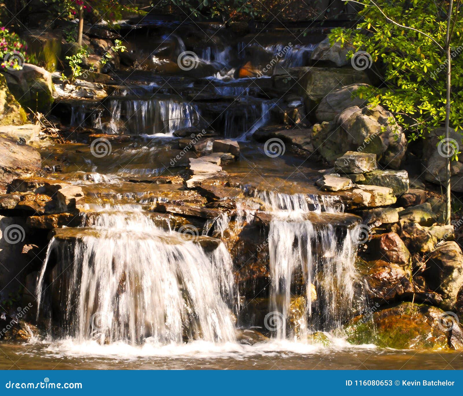 Water Cascades Over Rocks and into a Pool Stock Image - Image of rock ...