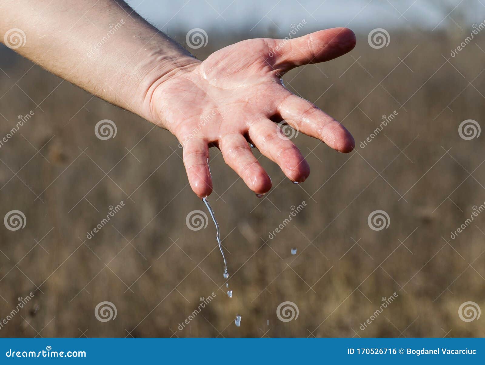 Water Flows on the Palm of the Man Stock Photo - Image of human ...