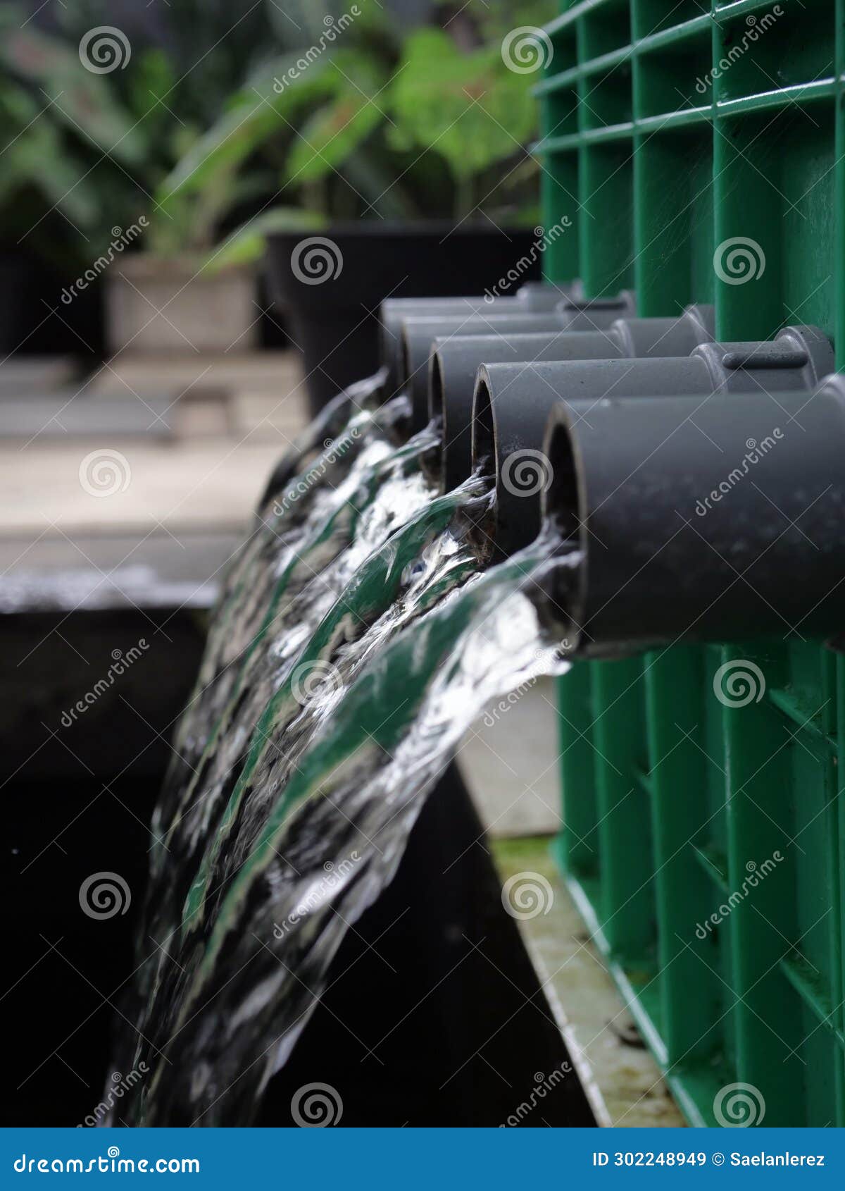 Clean Water Flows in a Pipe after Being Filtered in a Fish Pond Stock ...