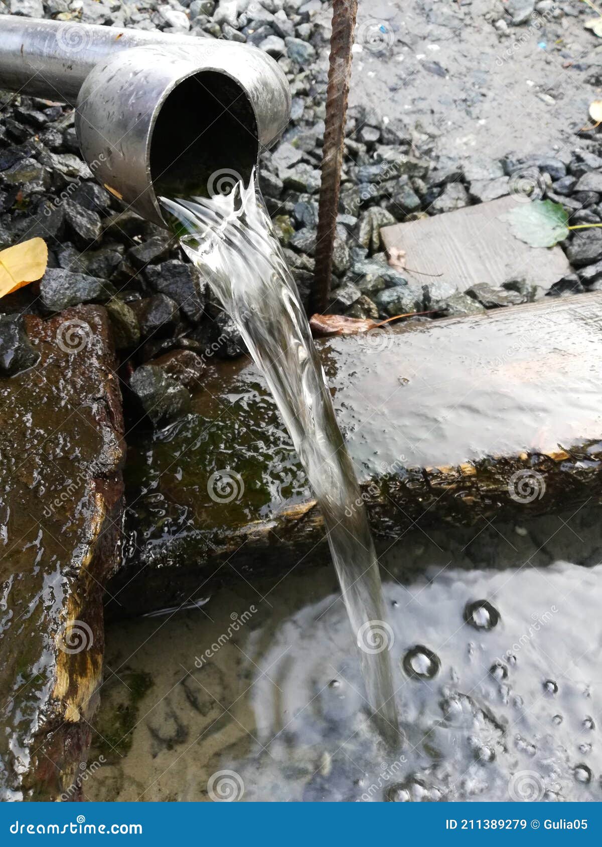 Water Flows from the Pipe. Spring Water. Clean Water Stock Image ...