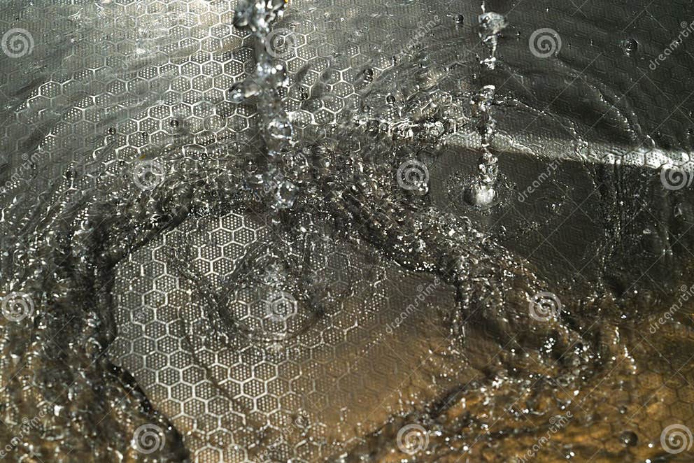 Water Splashing in a Textured Pot during Cooking Activity Stock Photo ...