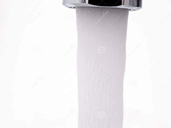 Water Flows from a Tap, Water Pressure on a White Background. Stock ...