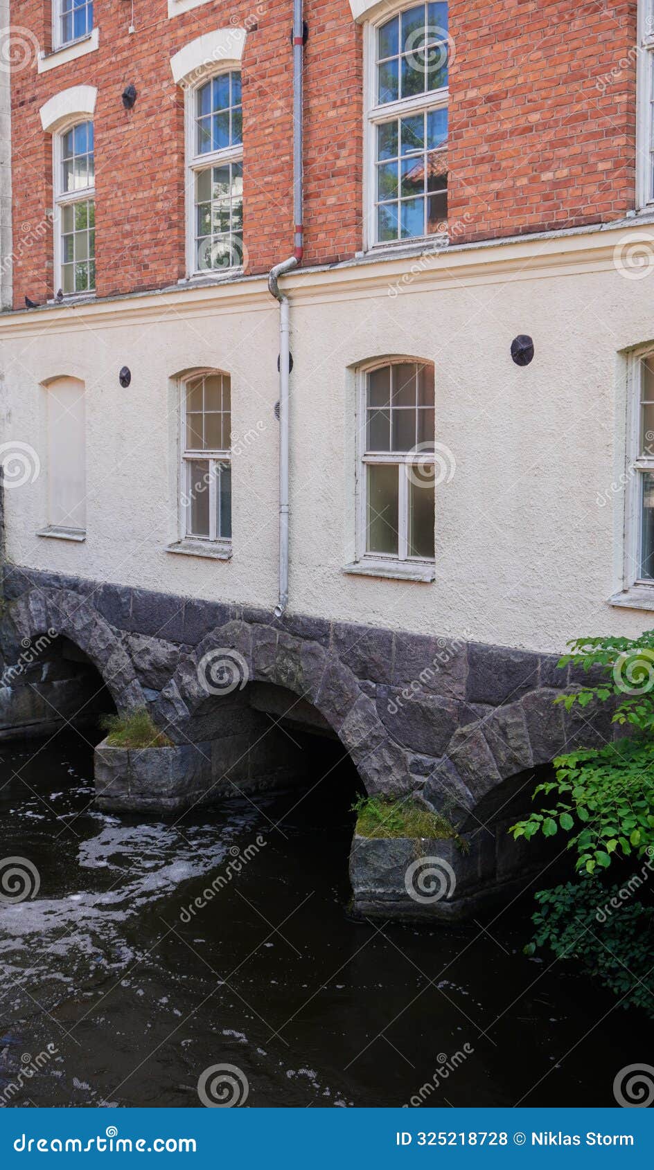 Water Flows Under a Building Stock Photo - Image of outdoors ...