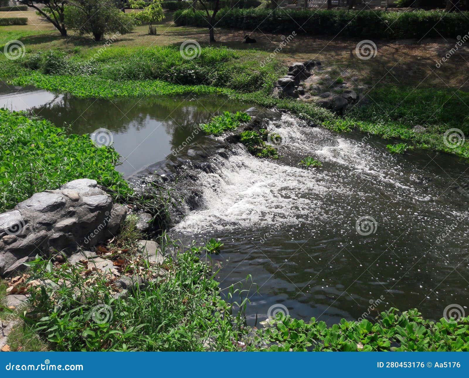 The Water Flows from the Upper Layer through the Weir To the Lateral ...