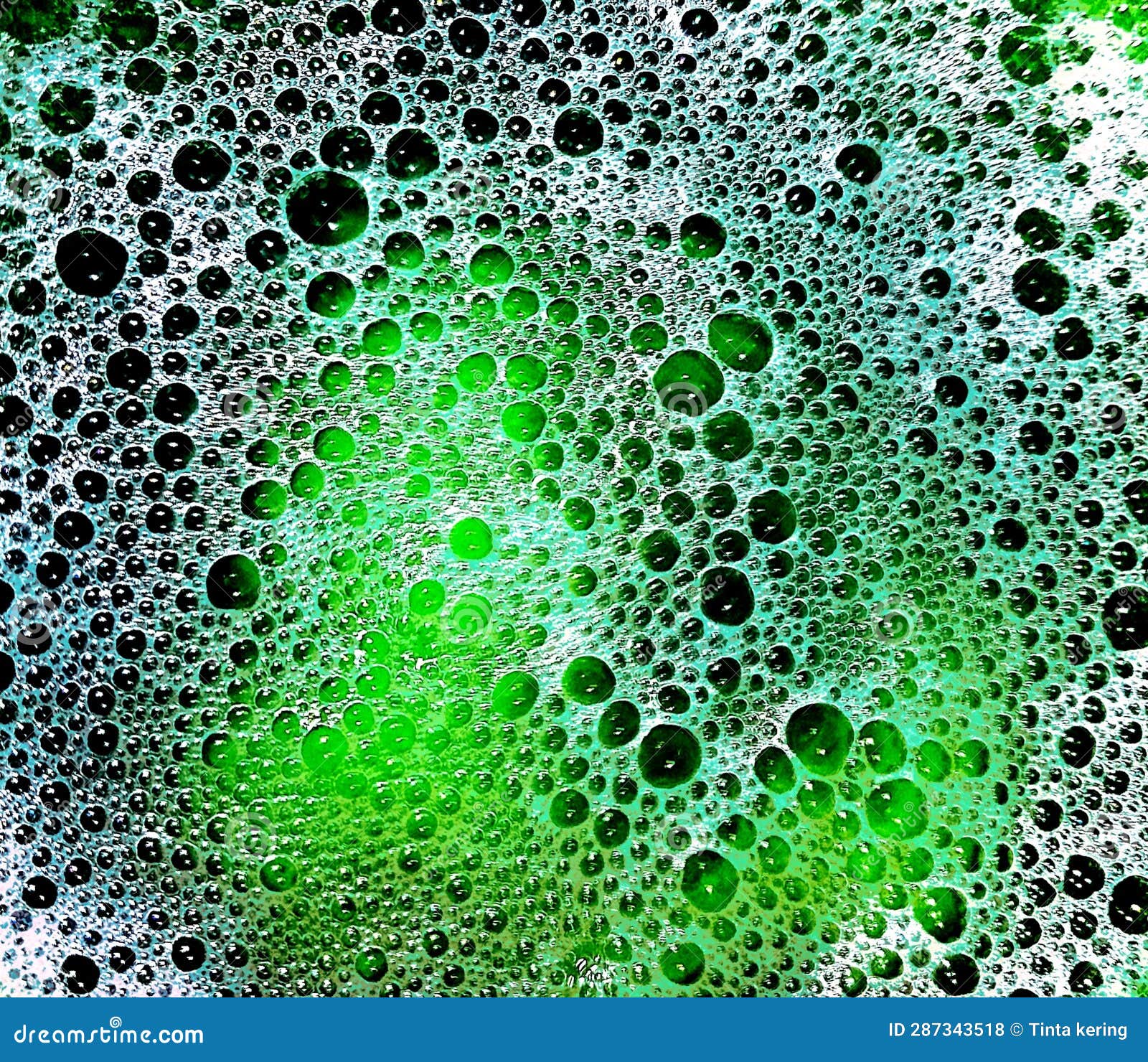 The Water Foaming from the Soapy Solution Creates Tiny Lumps on the ...