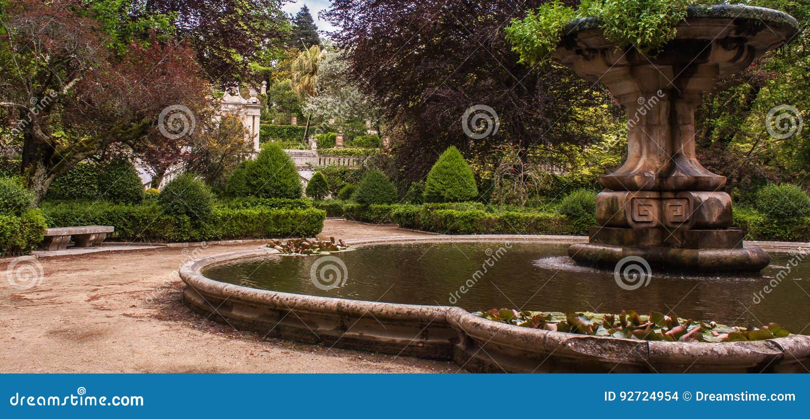 Water Fountain in Empty Park Stock Photo - Image of overgrown, light ...