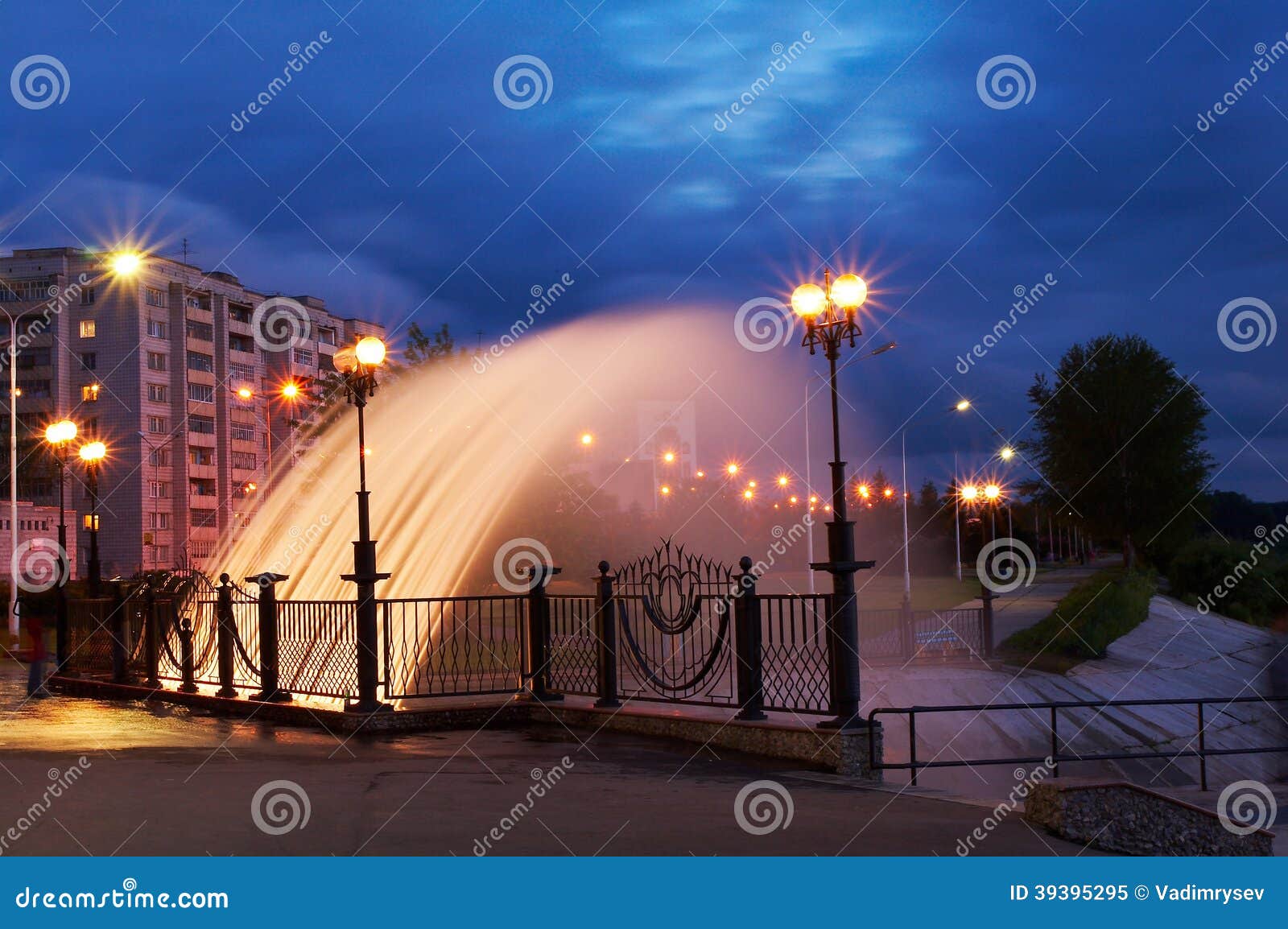 Water fountain at night stock image. Image of beauty - 39395295
