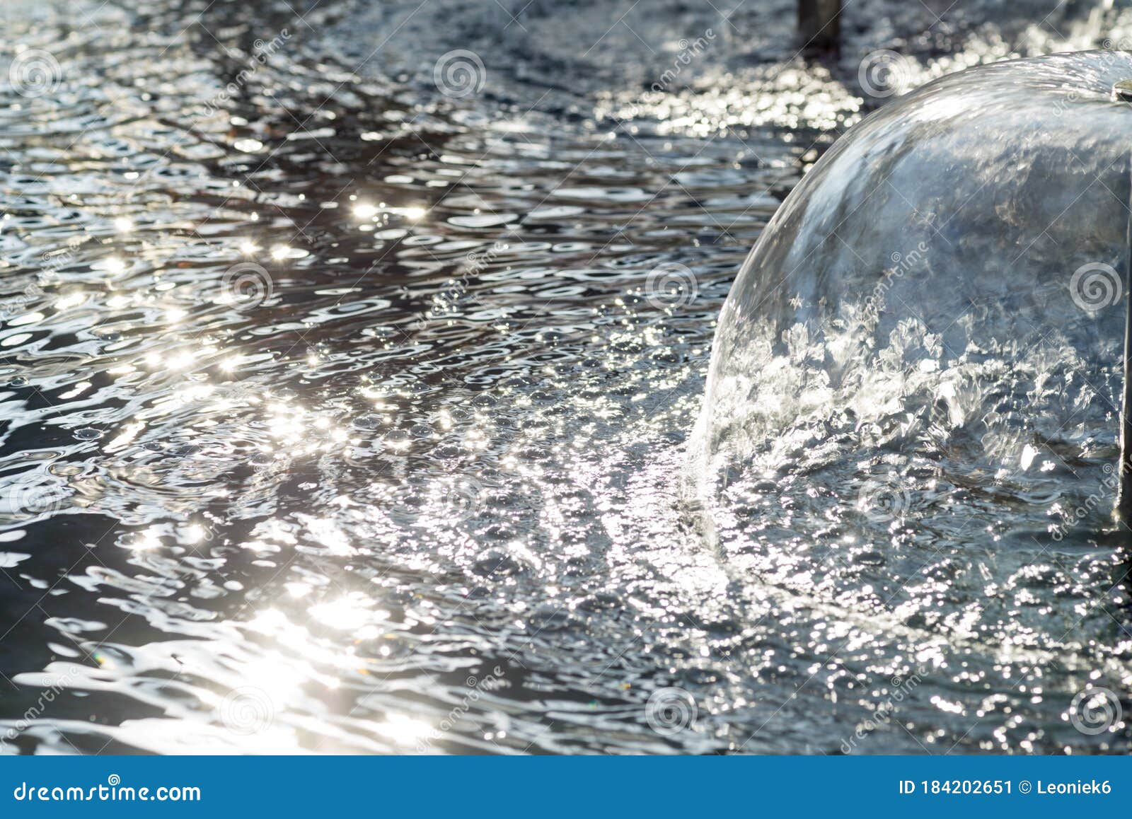 Water Fountain in a Pond with Reflection of the Sunlight Stock Image ...
