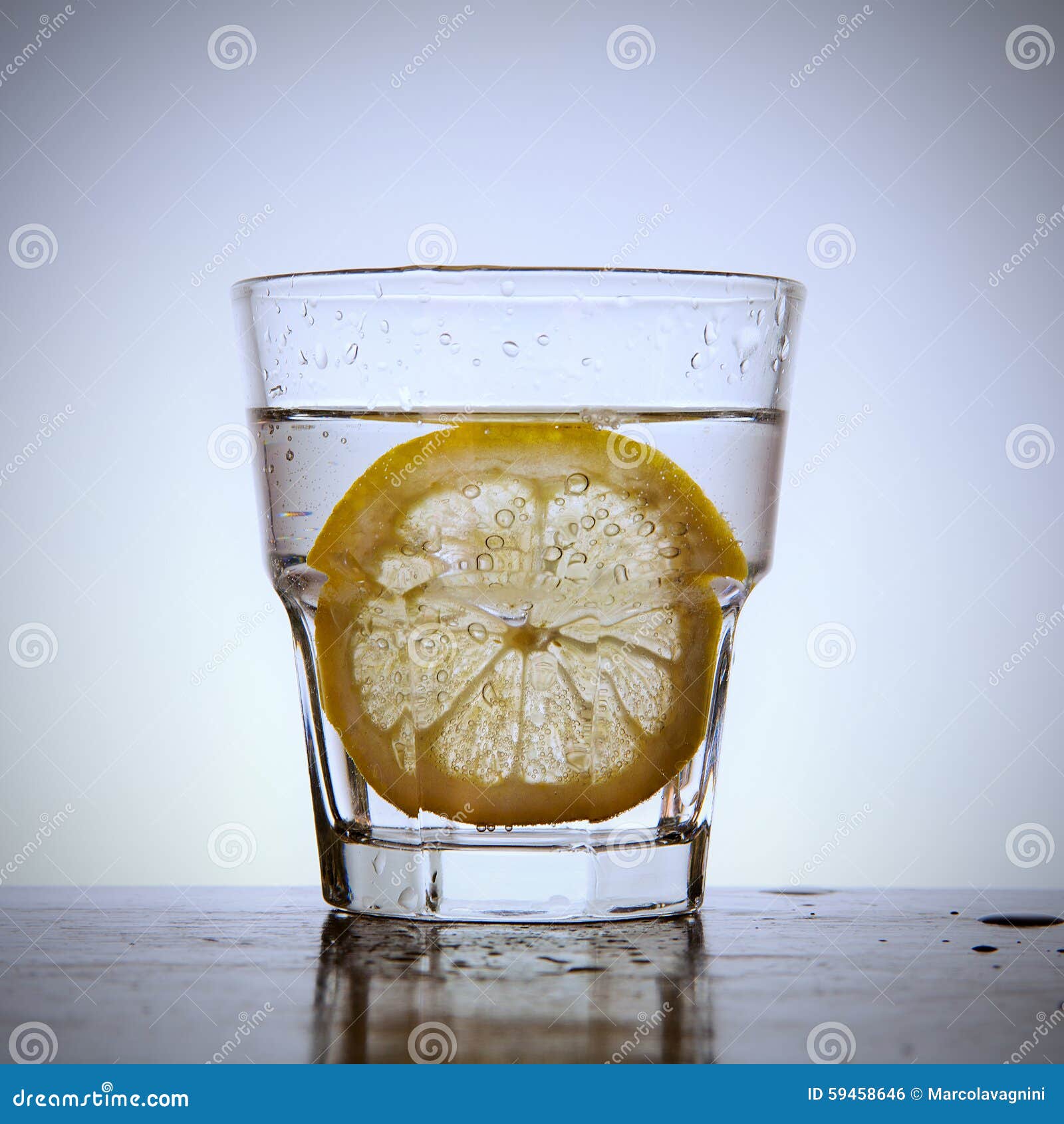 Water Glass with a Lemon Slice Stock Photo - Image of freshness, format ...
