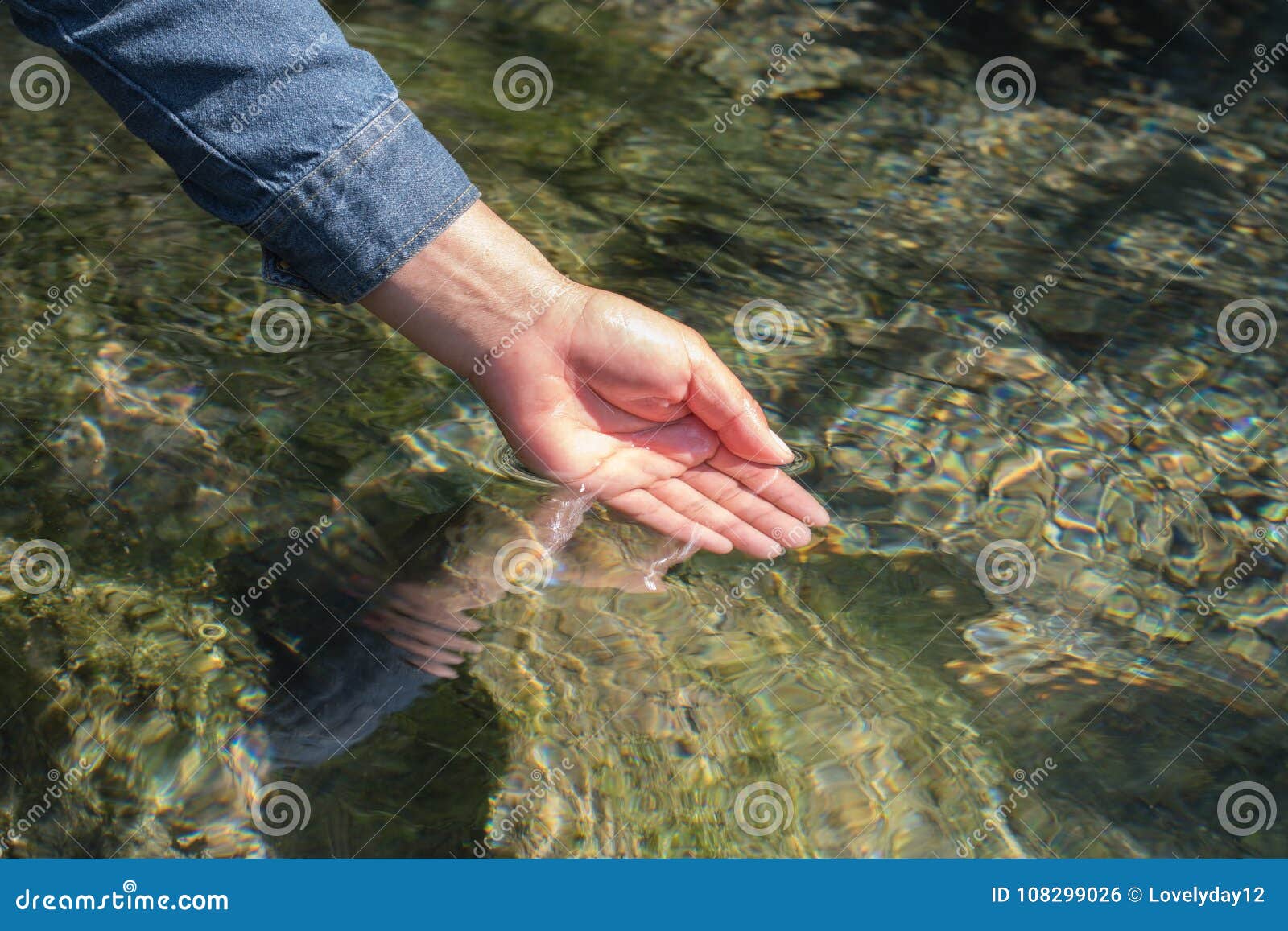 Water with hand stock photo. Image of lake, finger, freshness - 108299026