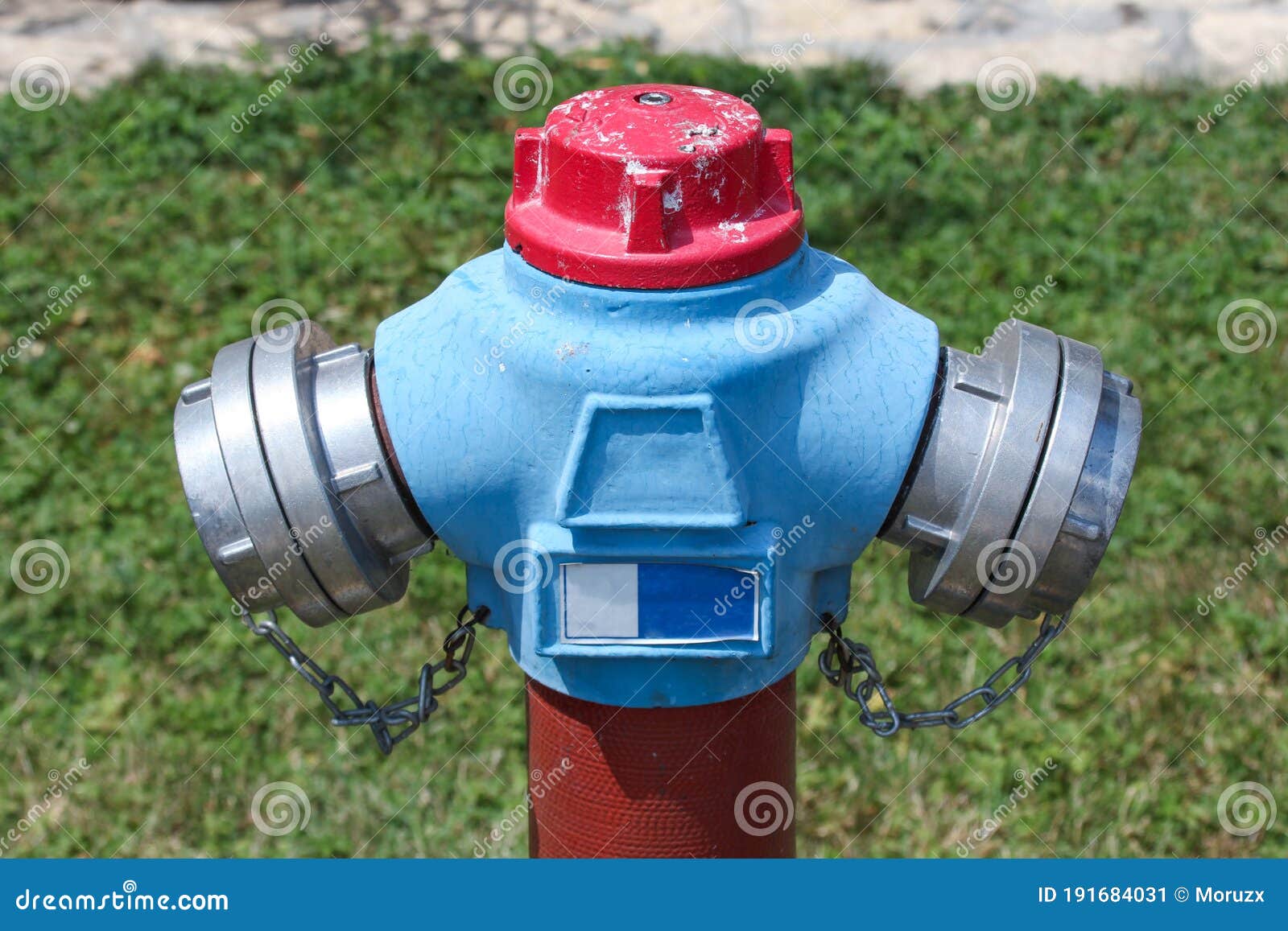Blue and red water hydrant stock image. Image of valve - 191684031