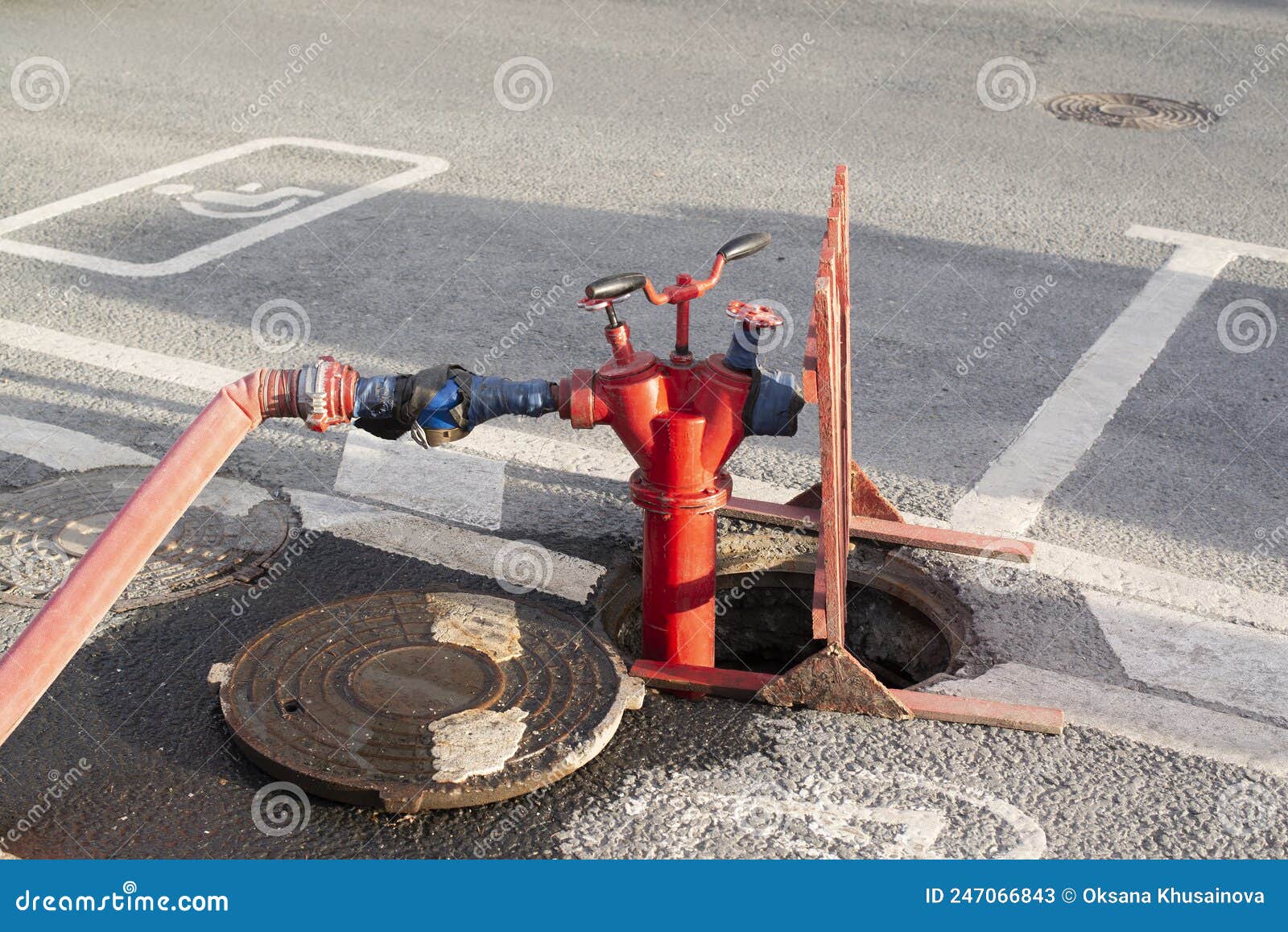 Water Hydrant with Hose on the Road in the City Stock Image - Image of ...