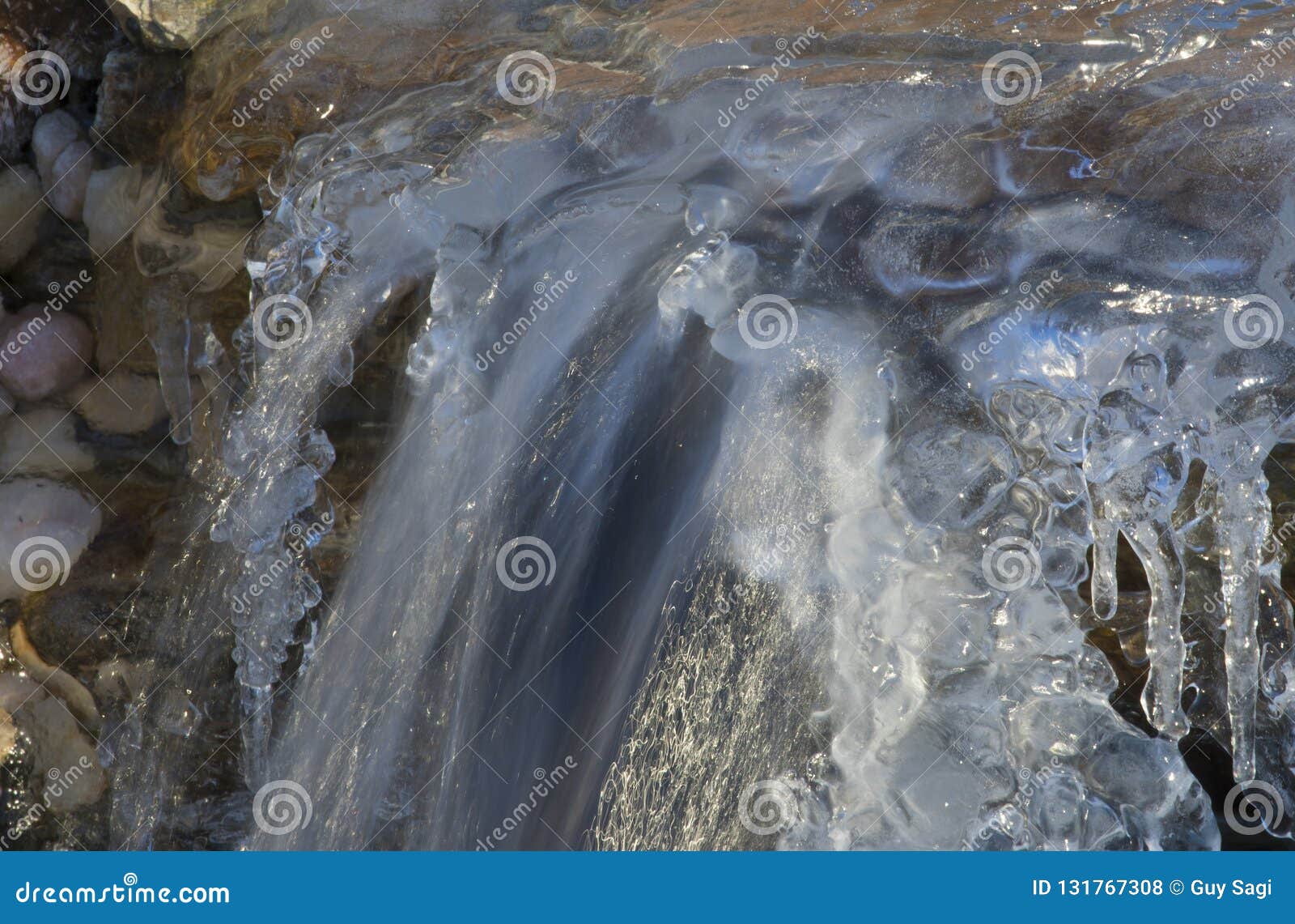 Water and Ice on Top of a Small Waterfall Stock Photo - Image of rocks ...