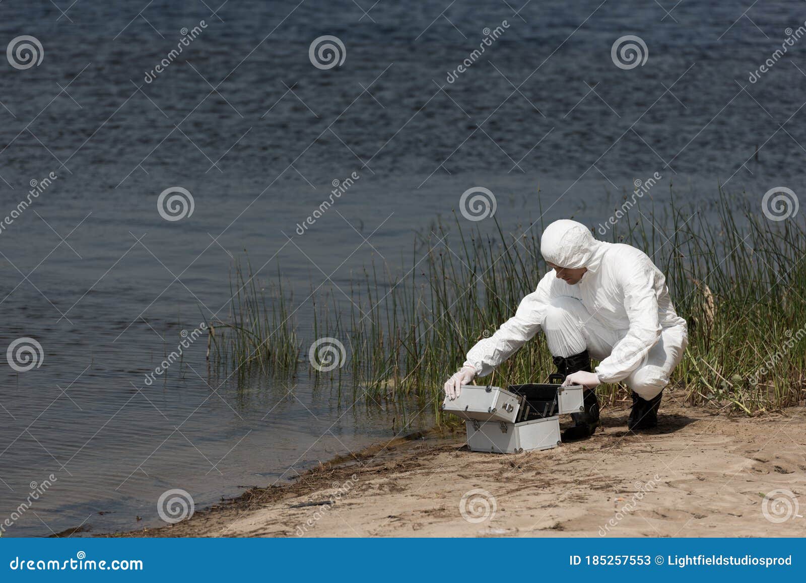 Water Inspector in Protective Costume with Inspection Kit Sitting Stock ...