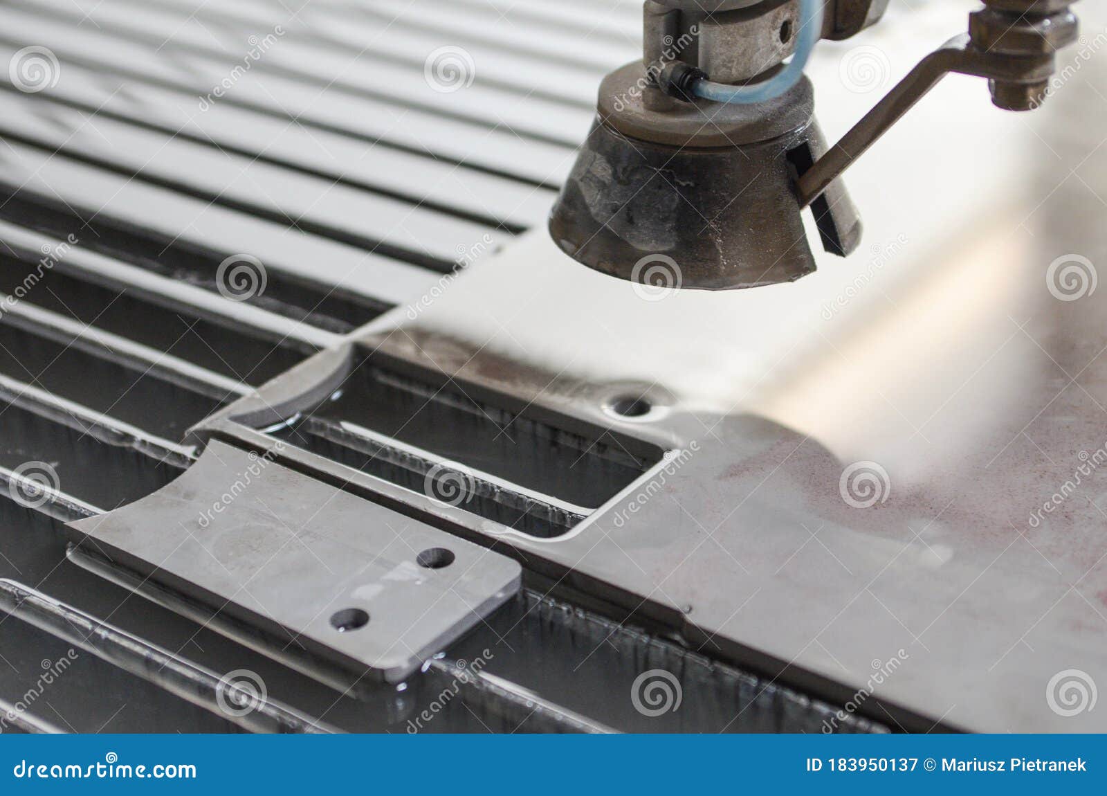 Water jet machine at work stock image. Image of iron - 183950137