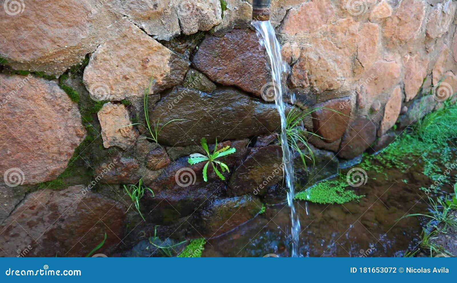 Water Jet from a Natural Spring and Stone Wall Stock Footage - Video of ...