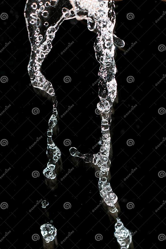 Water Jet with Spray on a Black Background Stock Photo - Image of ...