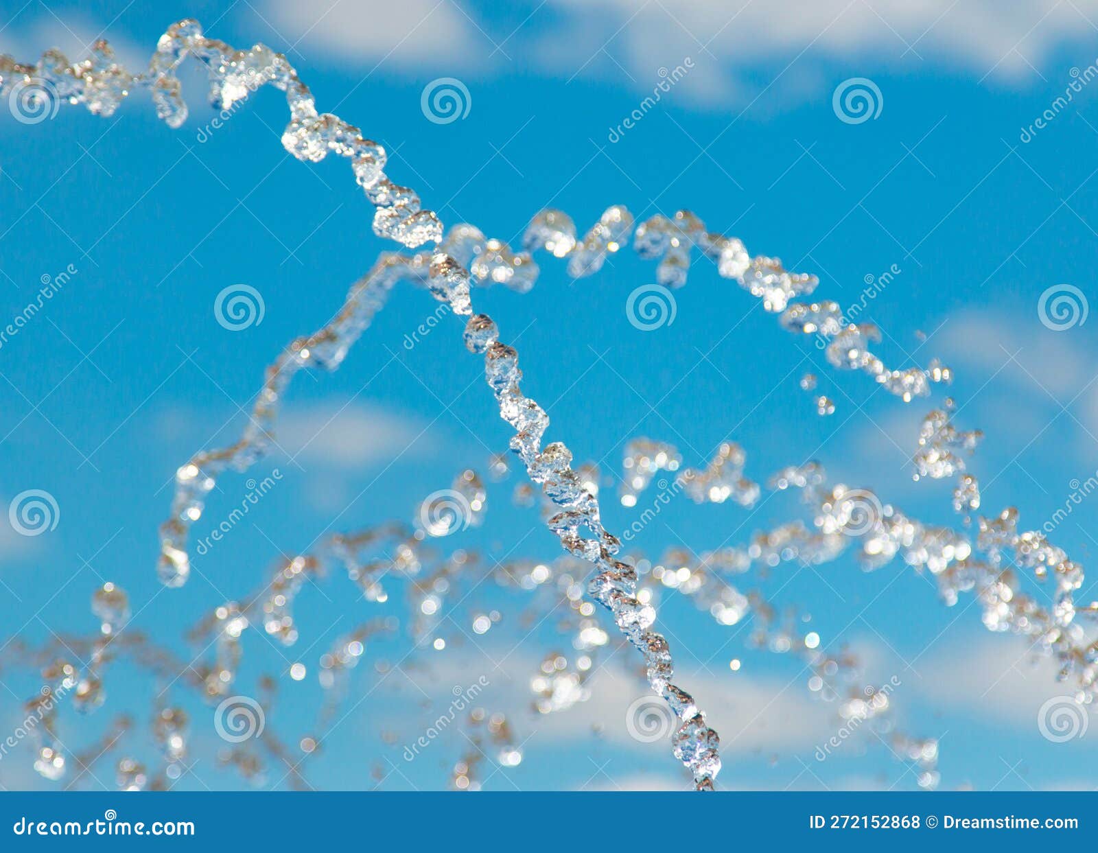 Water Jet with Spray on the Sky Background Stock Photo - Image of blue ...