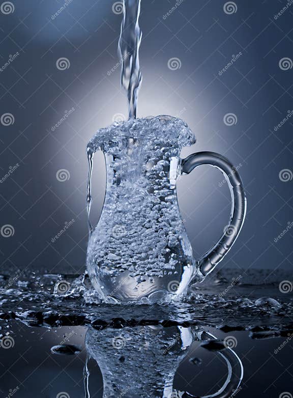 Water in a jug stock photo. Image of overfill, cool, flowing - 25467412