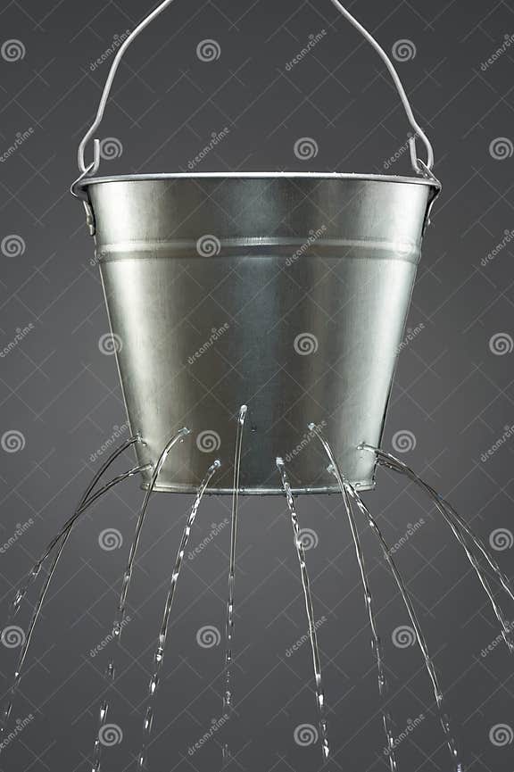 Water leaking from bucket stock image. Image of bucket - 30848081